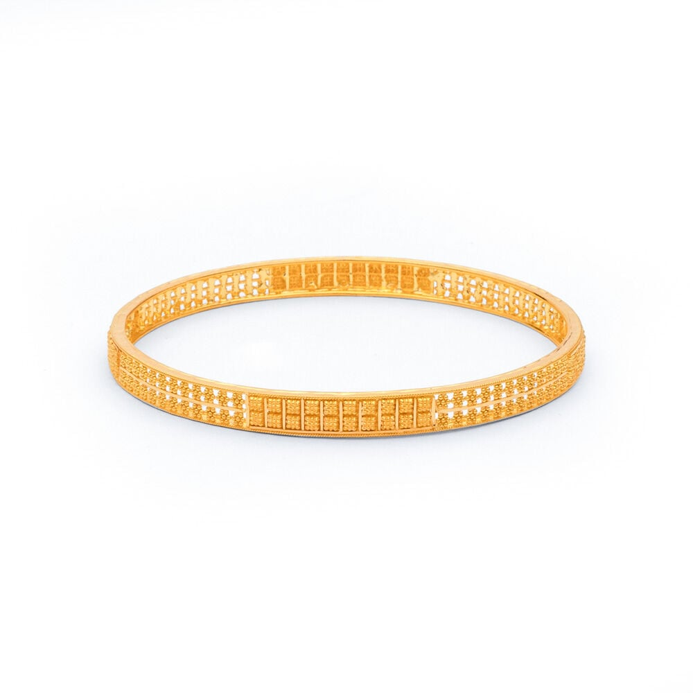Buy Whispers of Spring Gold Bangle at Best Price | Tanishq US