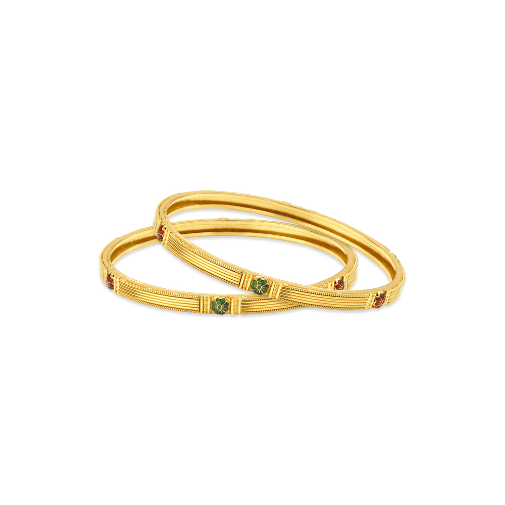 Buy Ardent Yellow Gold Ribbed Floral Bangles at Best Price | Tanishq UAE